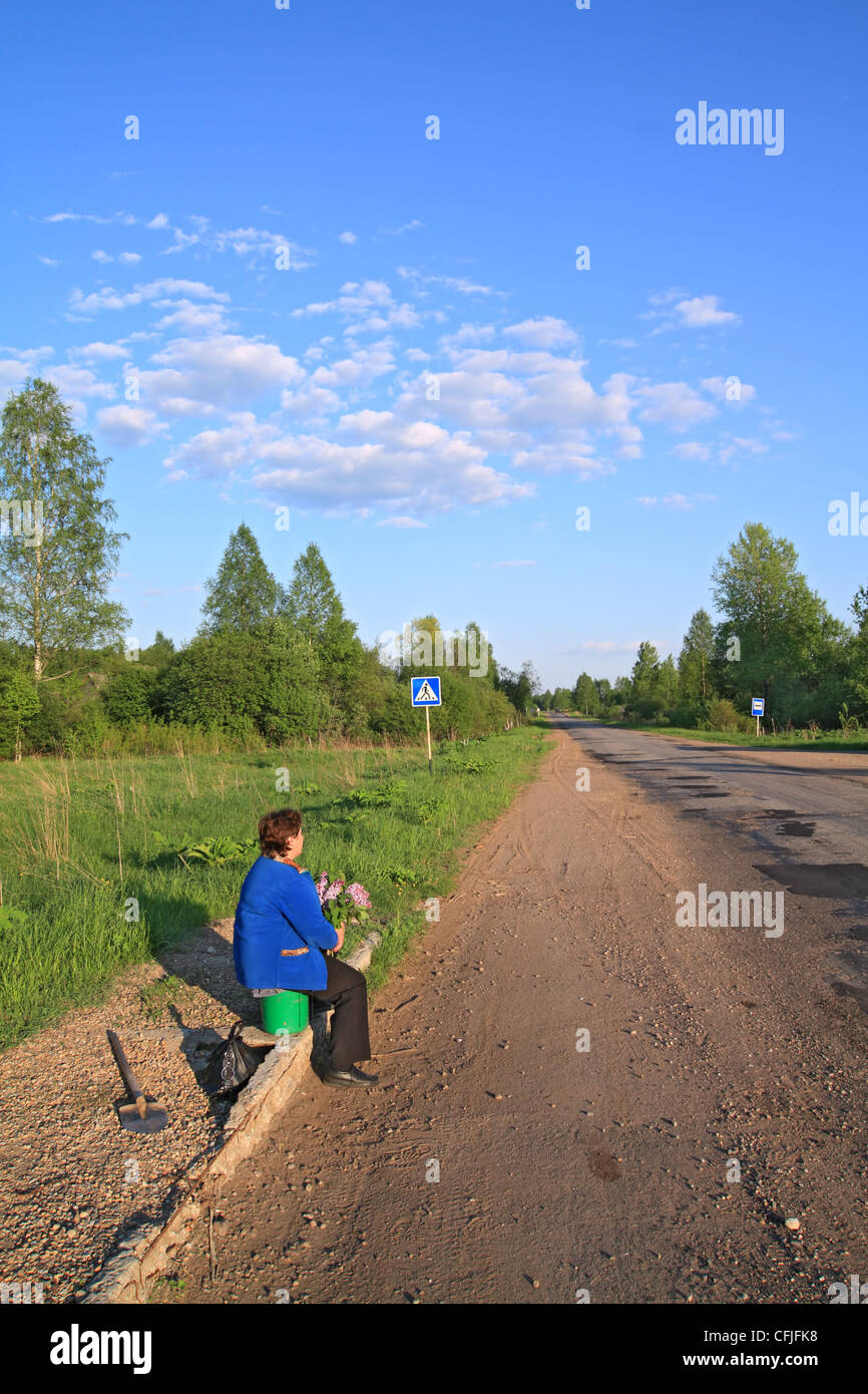 bus stop on rural road Stock Photo - Alamy