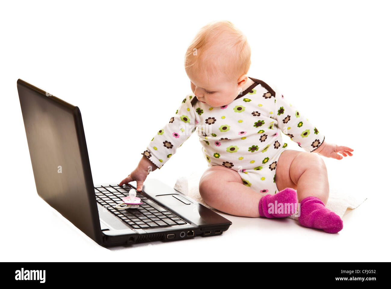 Infant with a notebook Stock Photo - Alamy