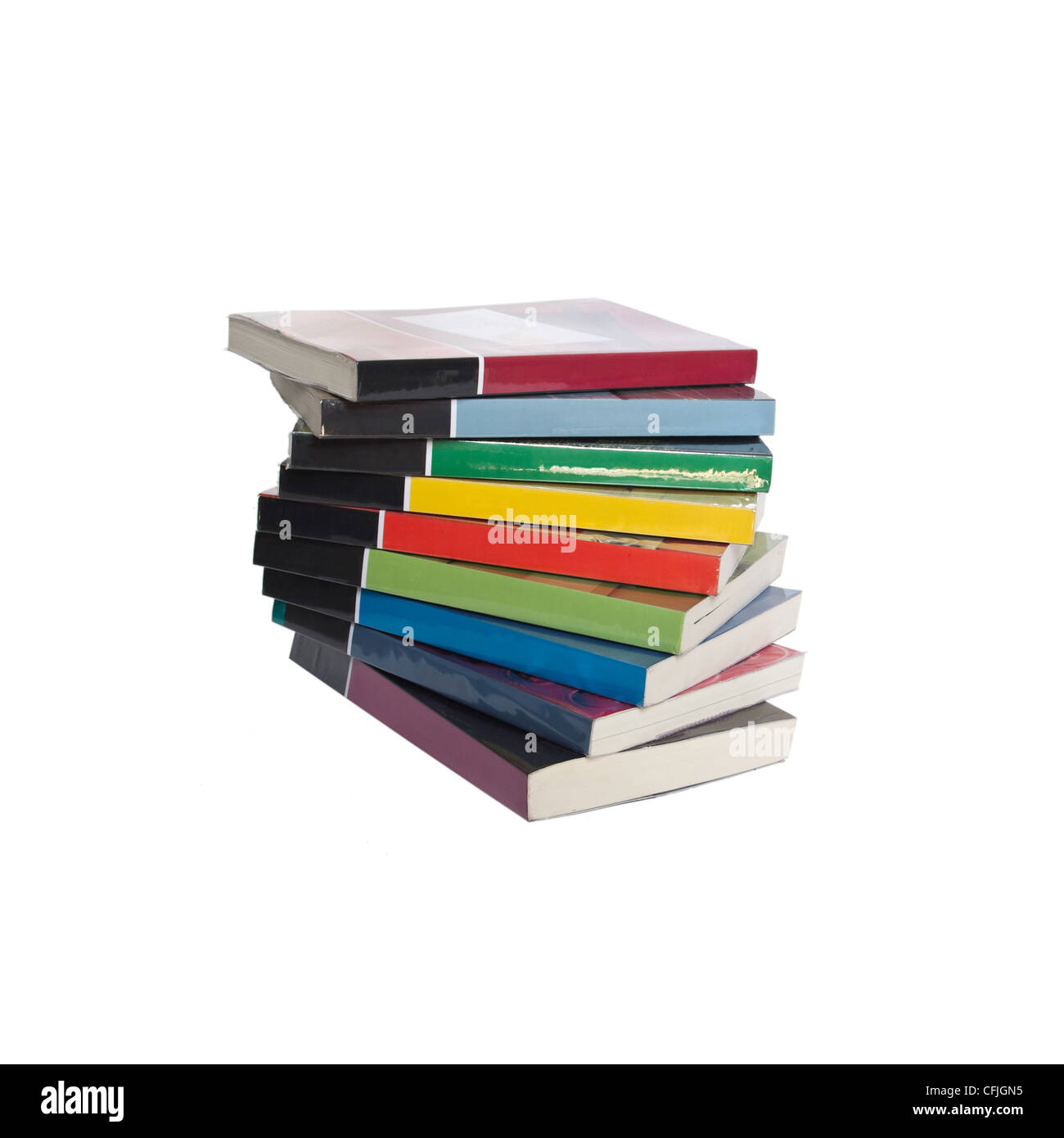 Isolated twisted stack of colorful real books Stock Photo - Alamy