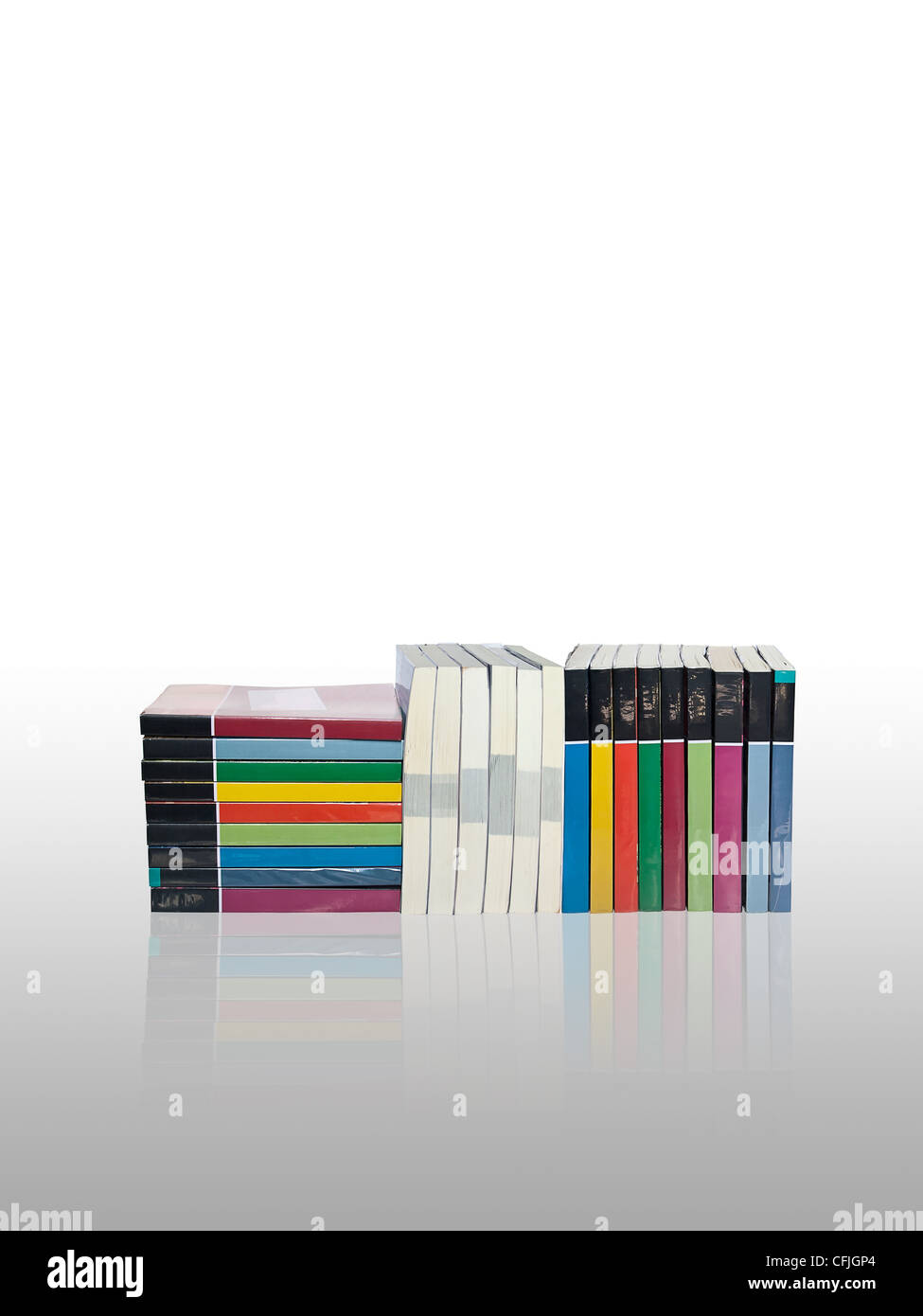 Isolated stacks of colorful real books Stock Photo - Alamy