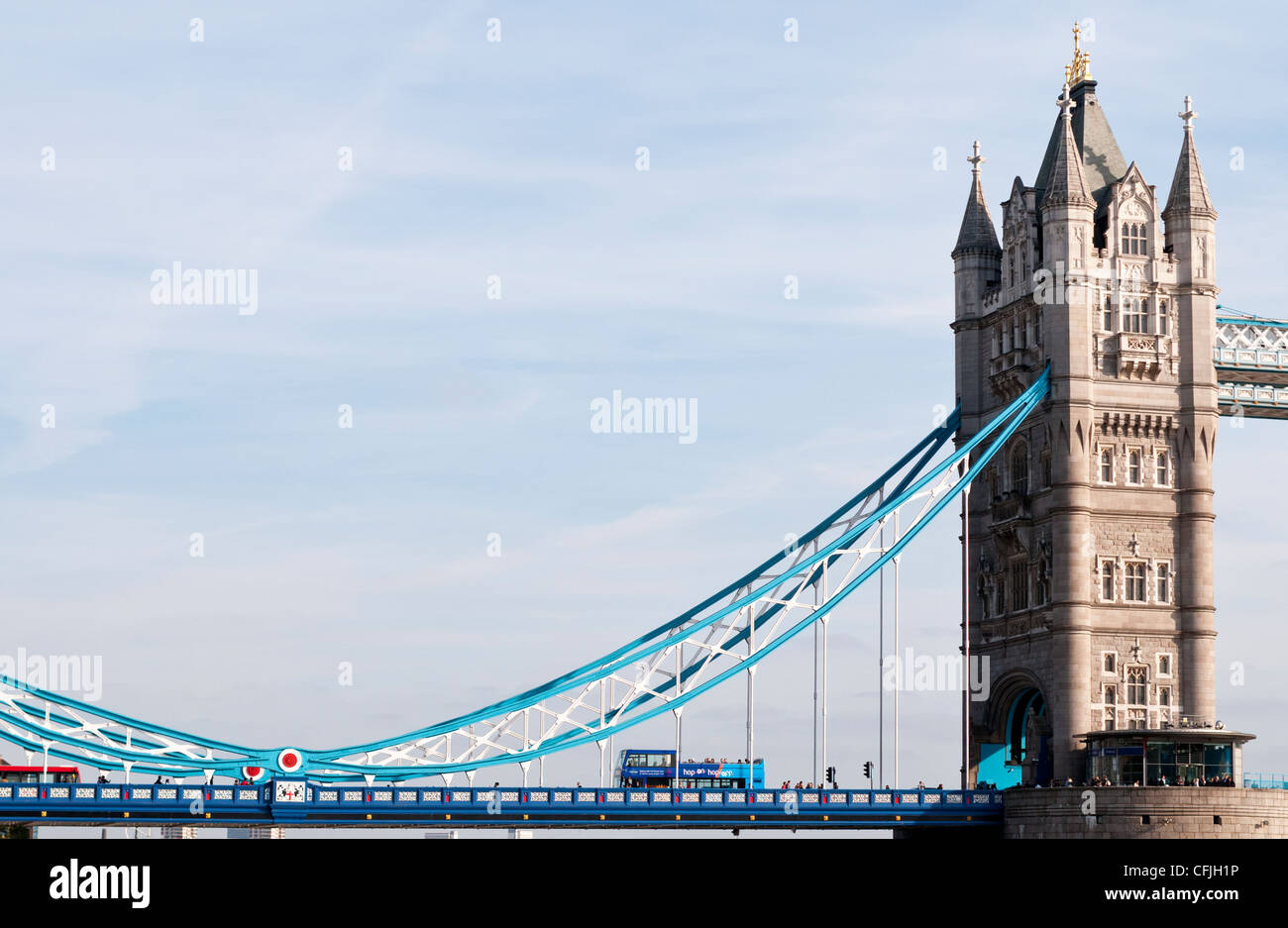 Blue bus on Tower Bridge, London, England, UK Stock Photo - Alamy