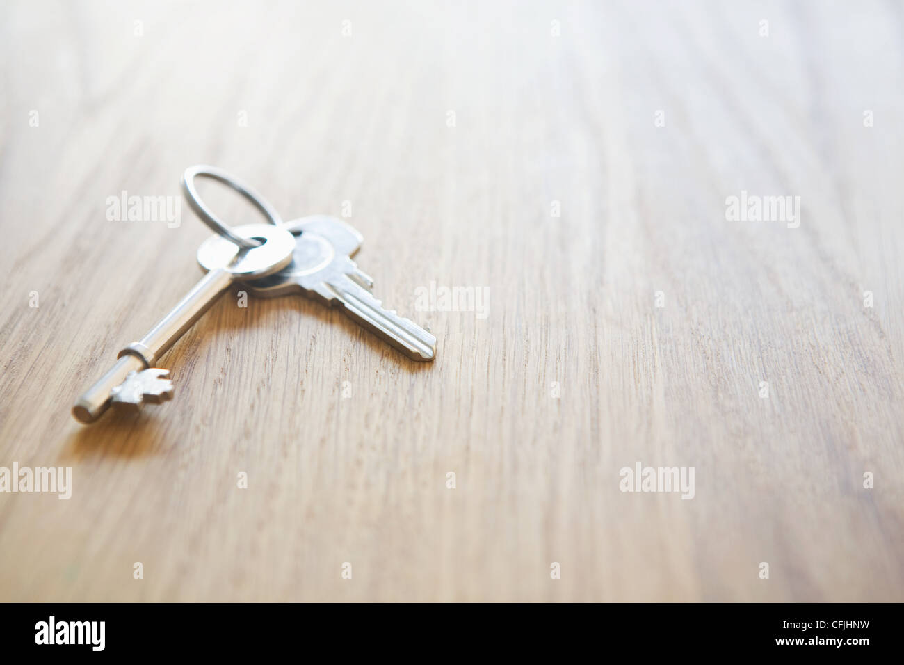House keys on a table Stock Photo - Alamy
