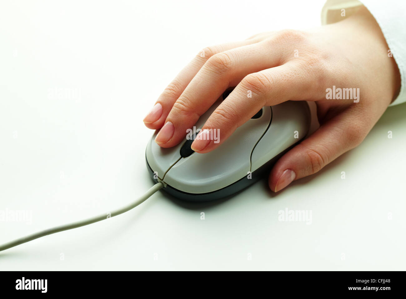 Hand on mouse cable hi-res stock photography and images - Alamy
