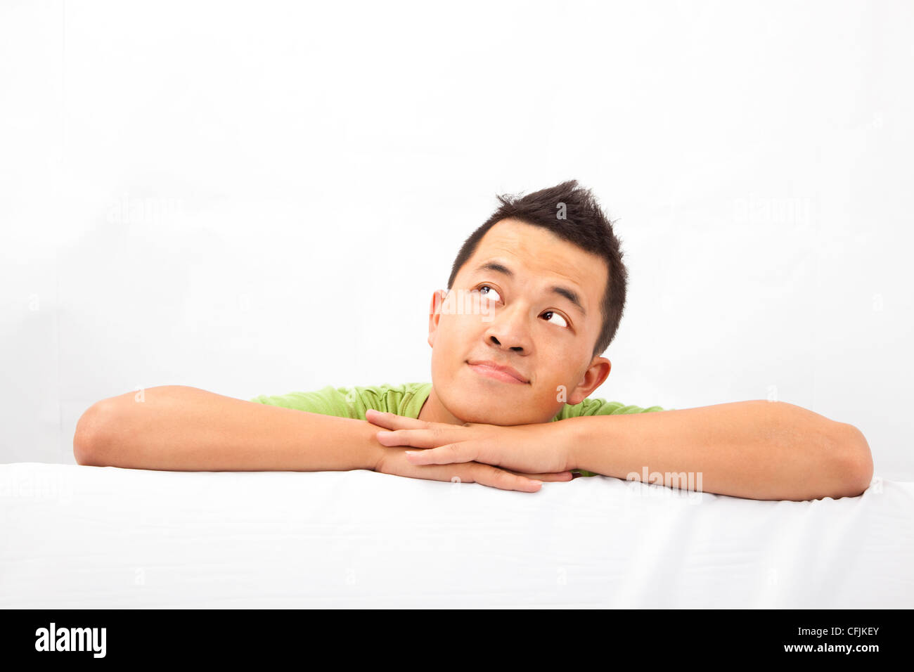 Young man face looking up Stock Photo - Alamy