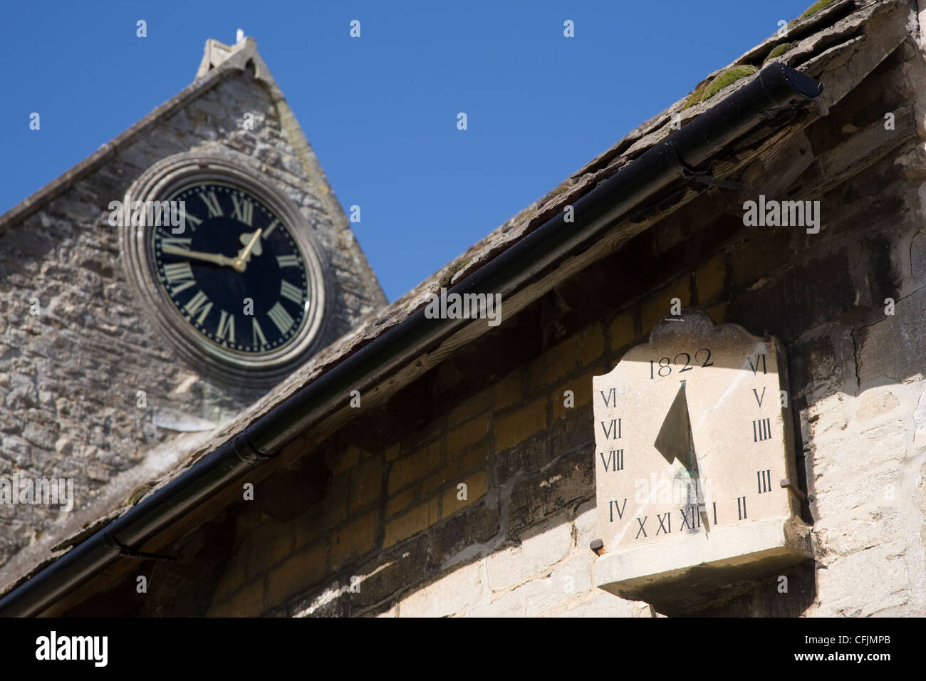 Sundial and mechanical clock on the Catholic church in Cricklade ...