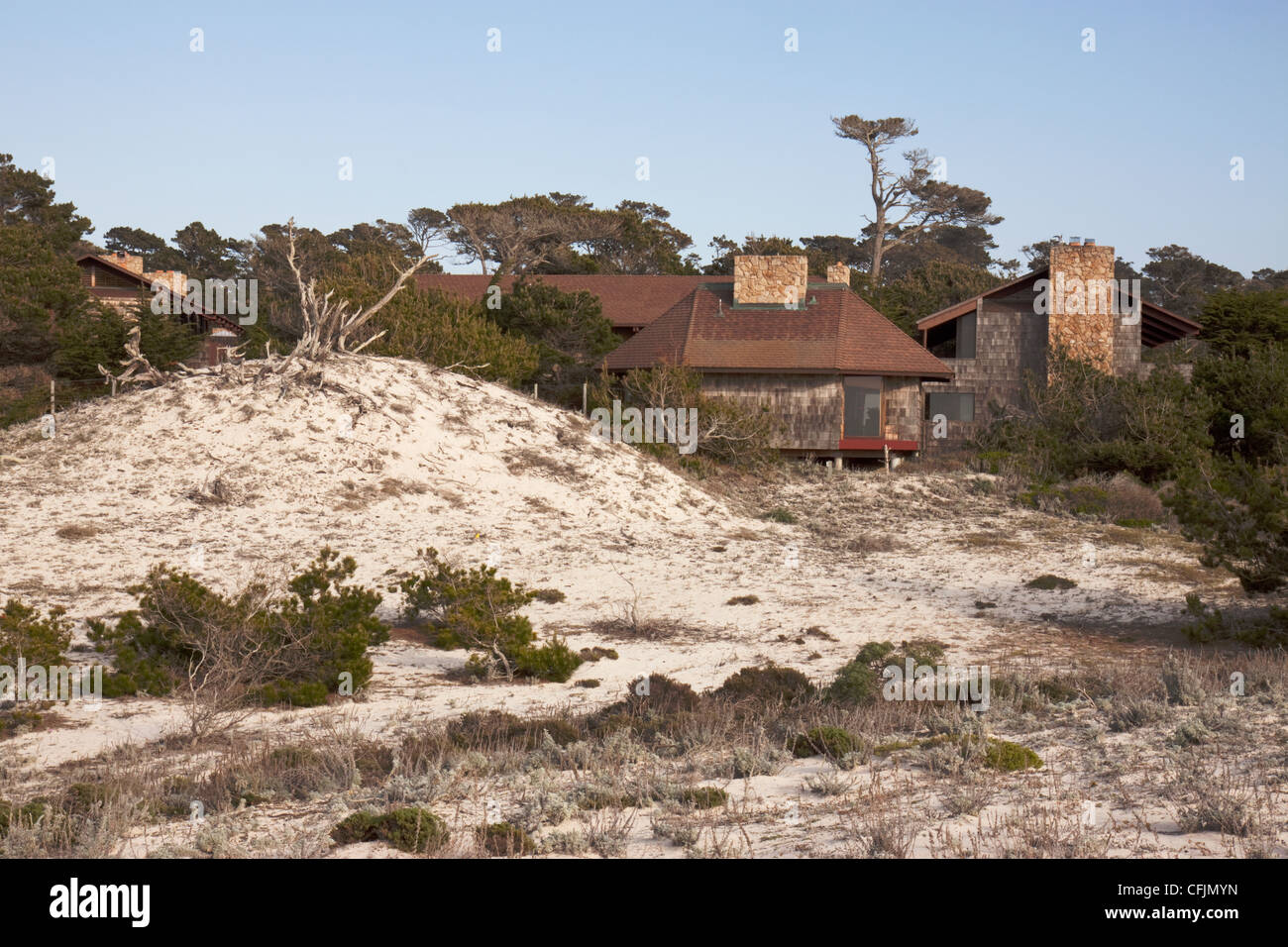 Sand dunes and buildings at Asilomar State Park near Pacific Grove ...