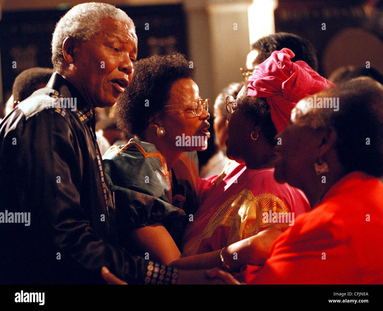 President Nelson Mandela and Graca Machel greeting people at the Father ...