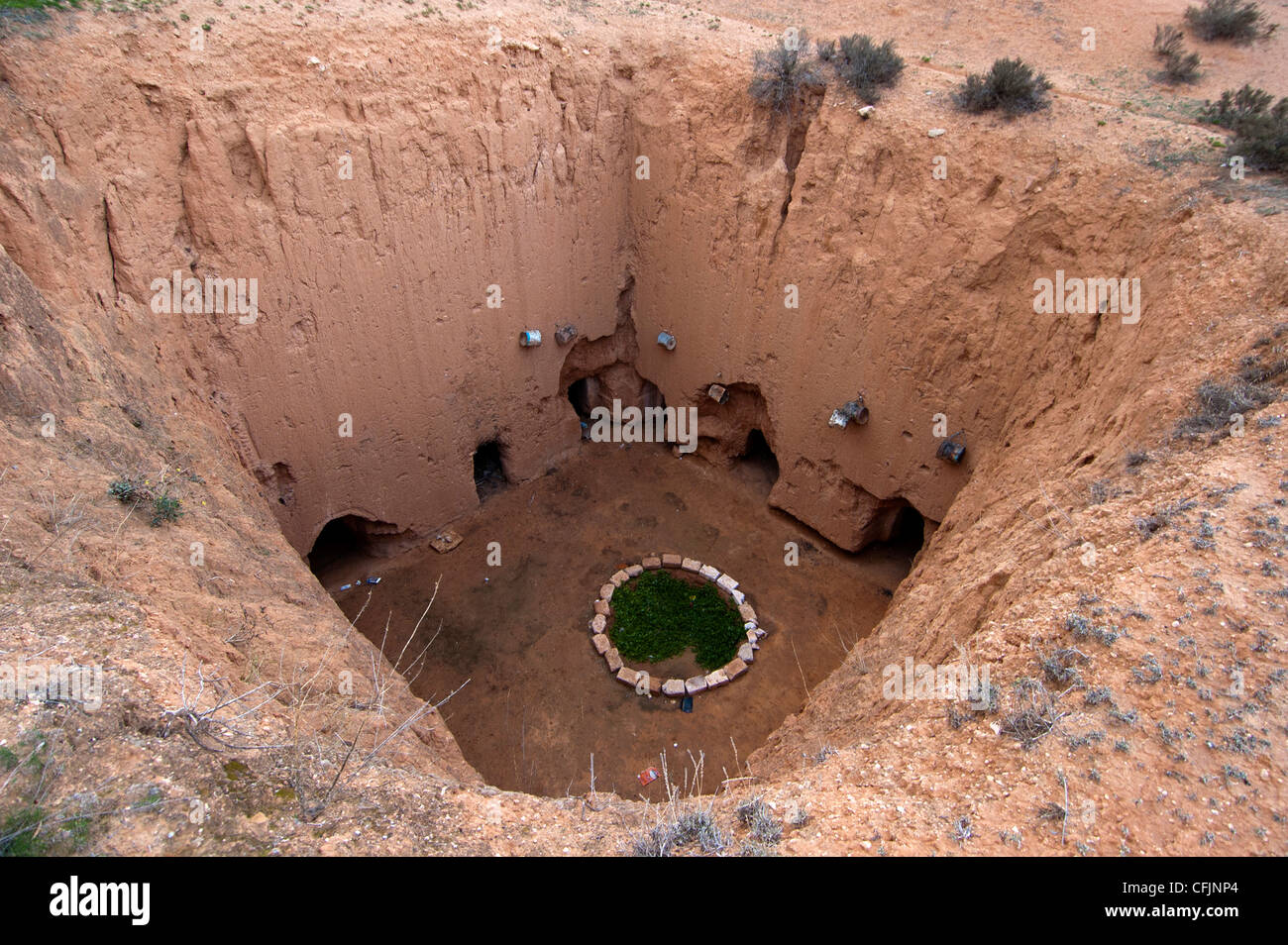 Topview into the inner yard of a cave dwelling, Ghariyan, Libya Stock ...