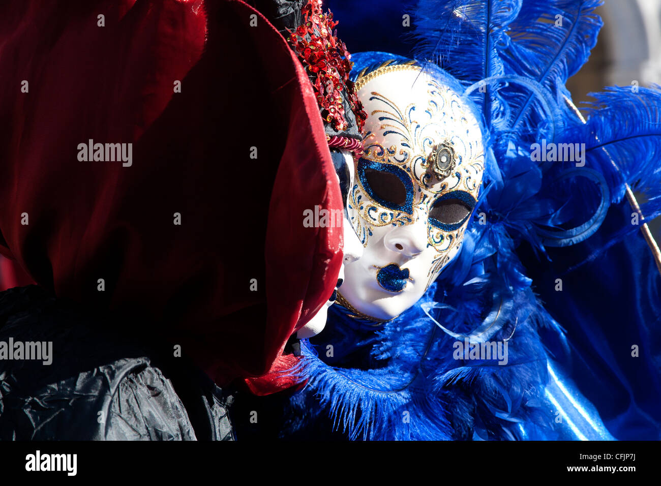 People dressed up in blue and red carnival costume for the Carnival of ...