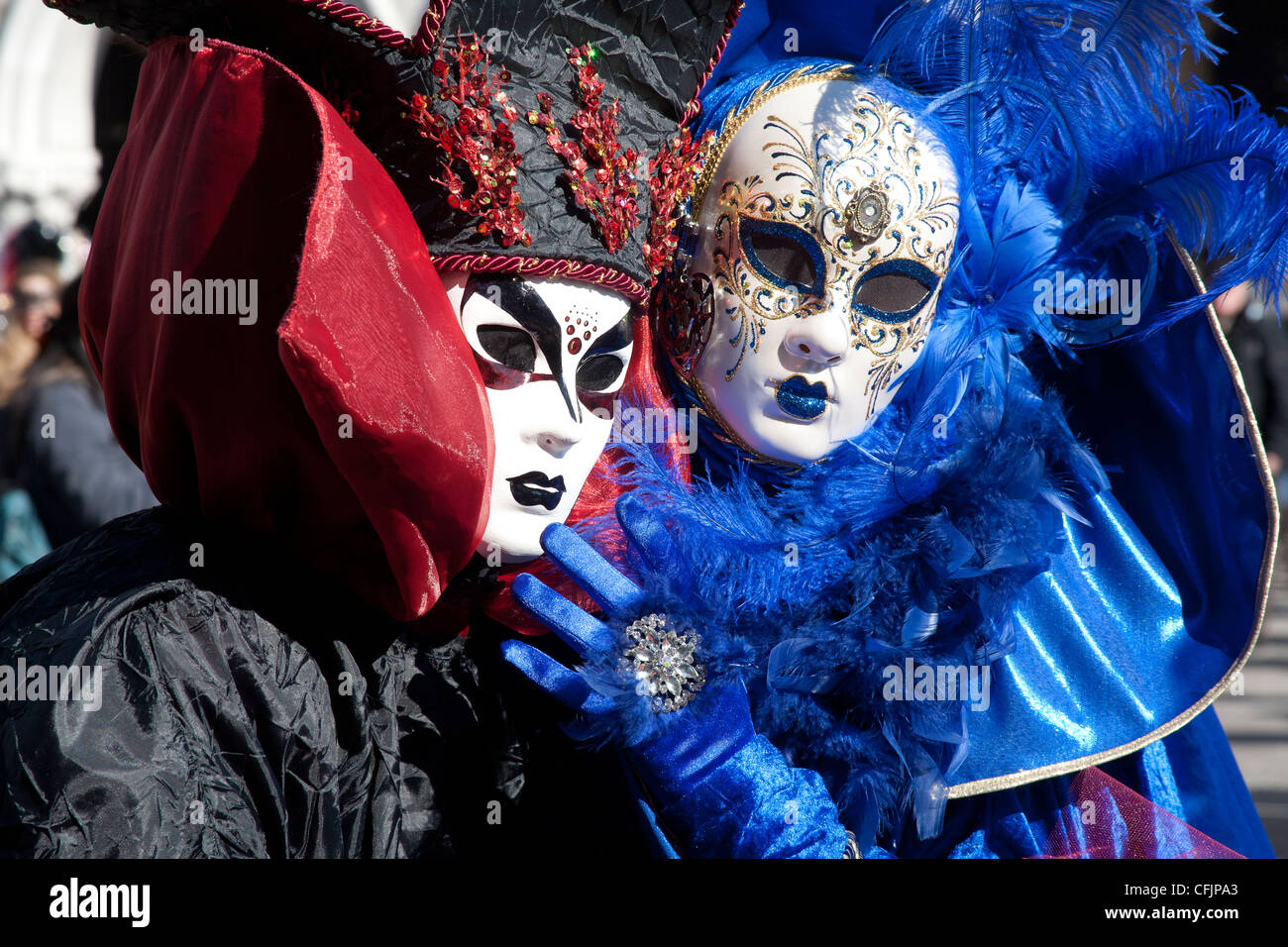 People dressed up in blue and red carnival costume for the Carnival of ...