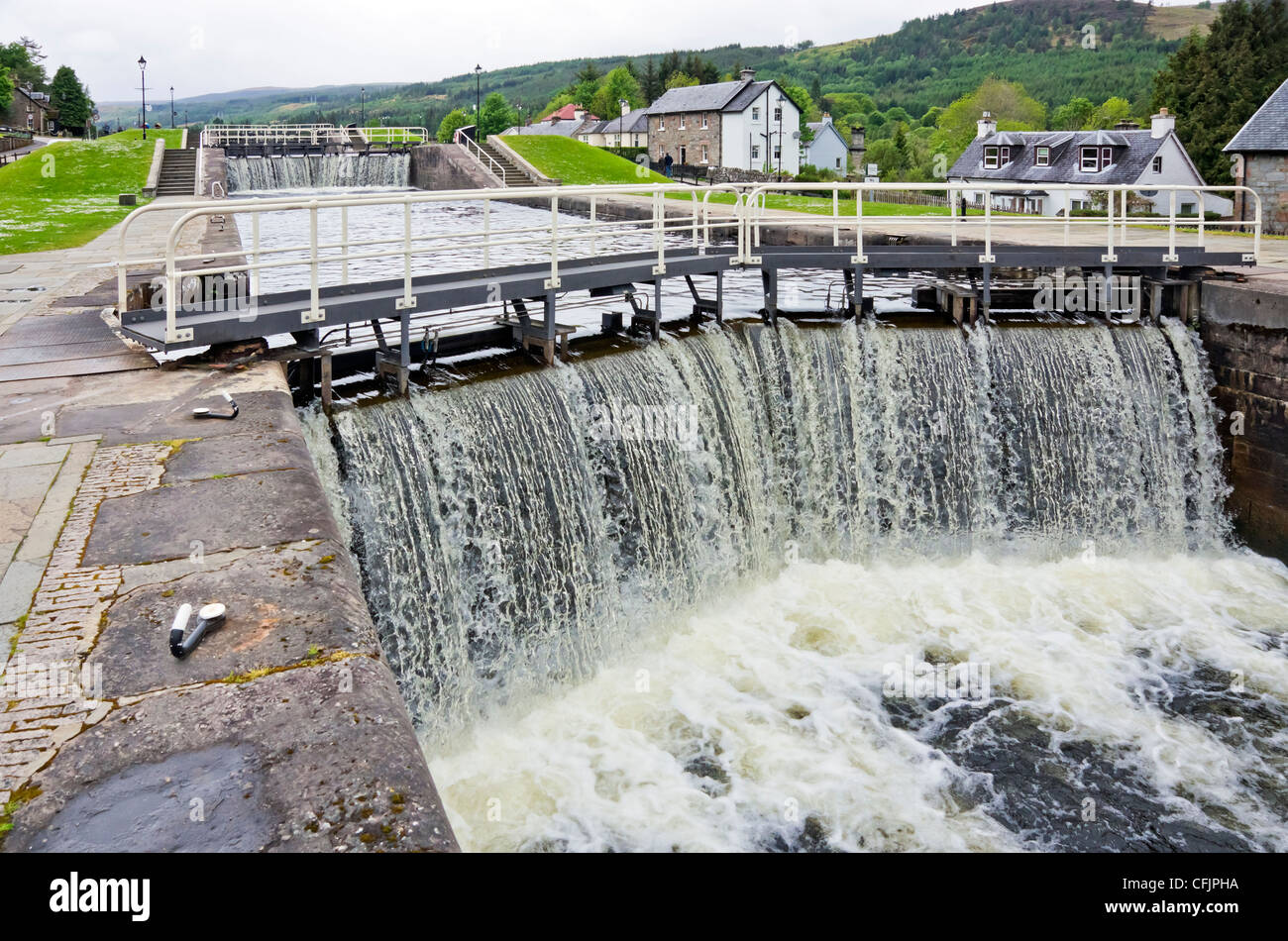 Excess water is rushing through the locks at the Caledonian Canal in ...