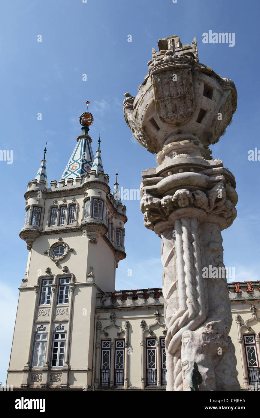 Gothic tower and heraldic column at the Town Hall (Camara Municipal) in ...