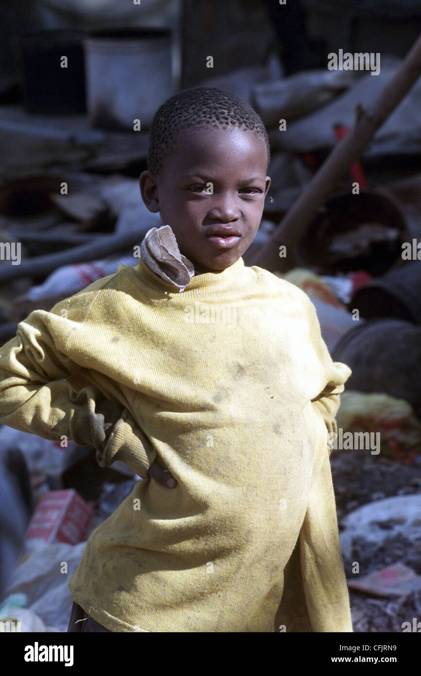 Squatter community living in squalor near a municipal dumping site in ...