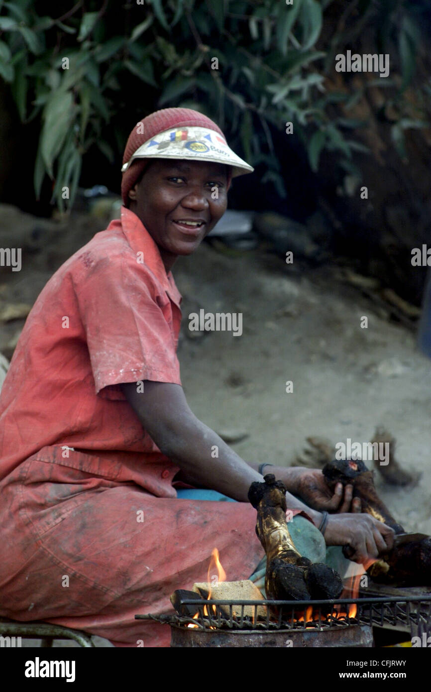 Squatter community living in squalor near a municipal dumping site in ...