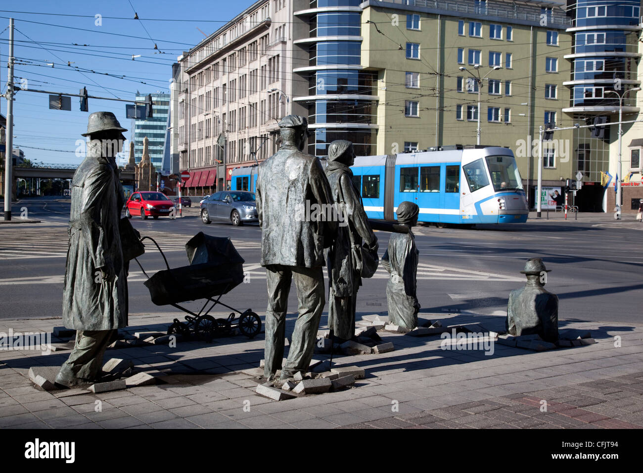Memorial statues and tram, Old Town, Wroclaw, Silesia, Poland, Europe ...