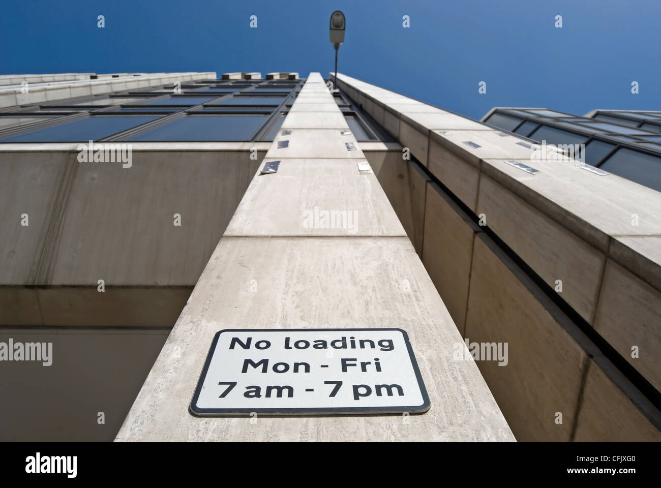 british no loading road sign giving days and hours of operation, london ...