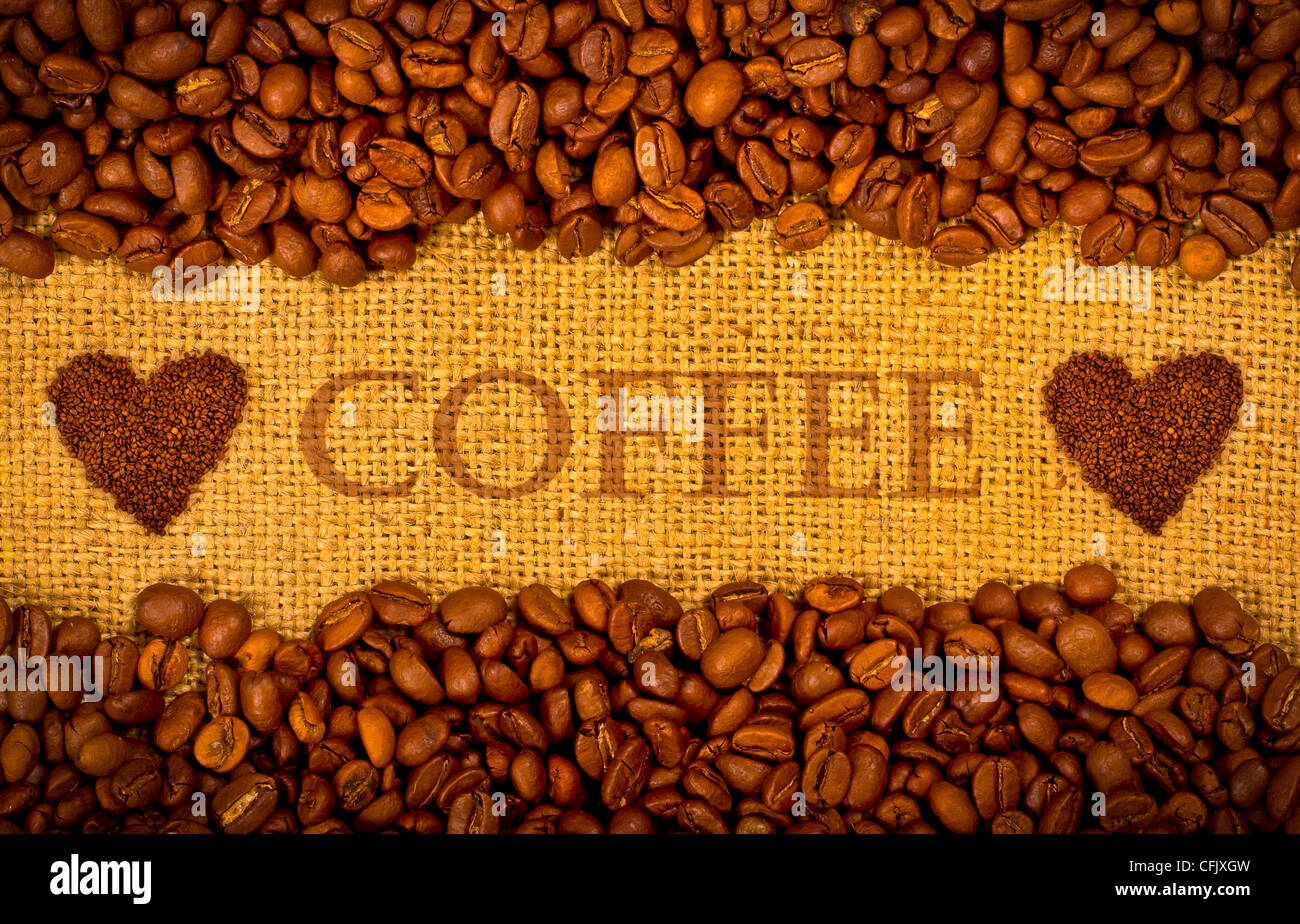 Coffee grains on the burlap background with copy space Stock Photo - Alamy