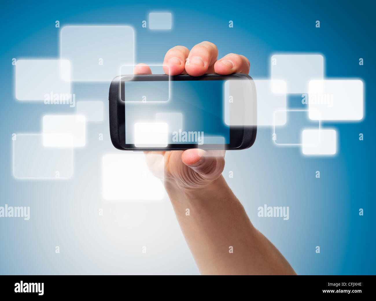 Hand holding Multimedia phone Stock Photo - Alamy