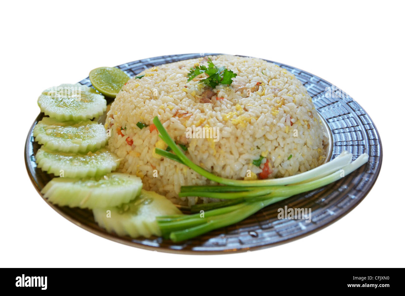 fried rice served with cucumber and spring Onion Stock Photo - Alamy