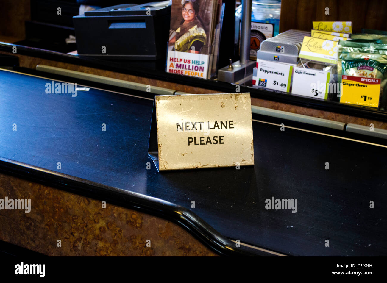 Next line please sign in the grocery store Stock Photo - Alamy