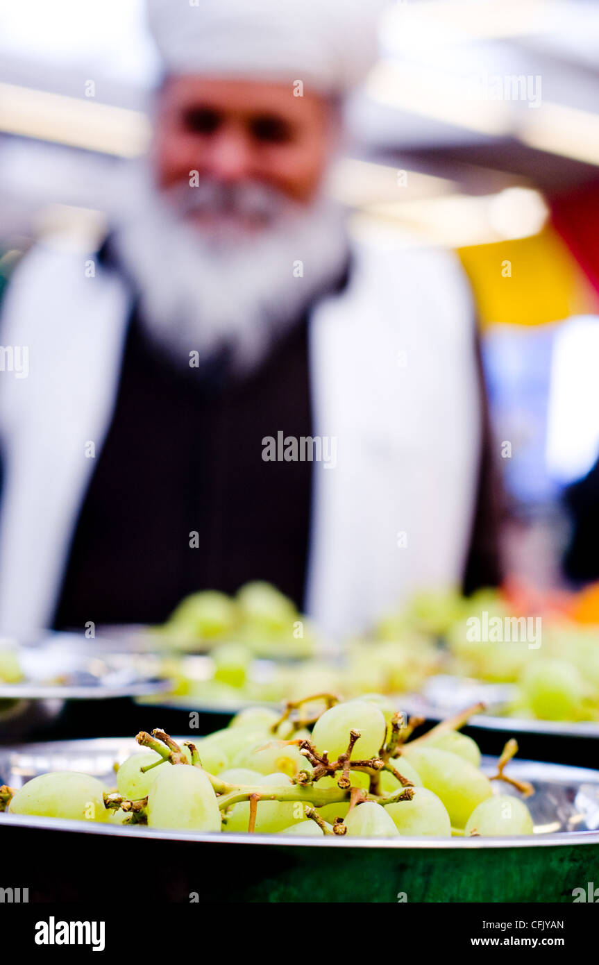 man and grapes Stock Photo - Alamy
