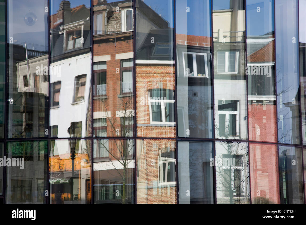 Traditional buildings in Brussels refected in the mirror windows of a ...