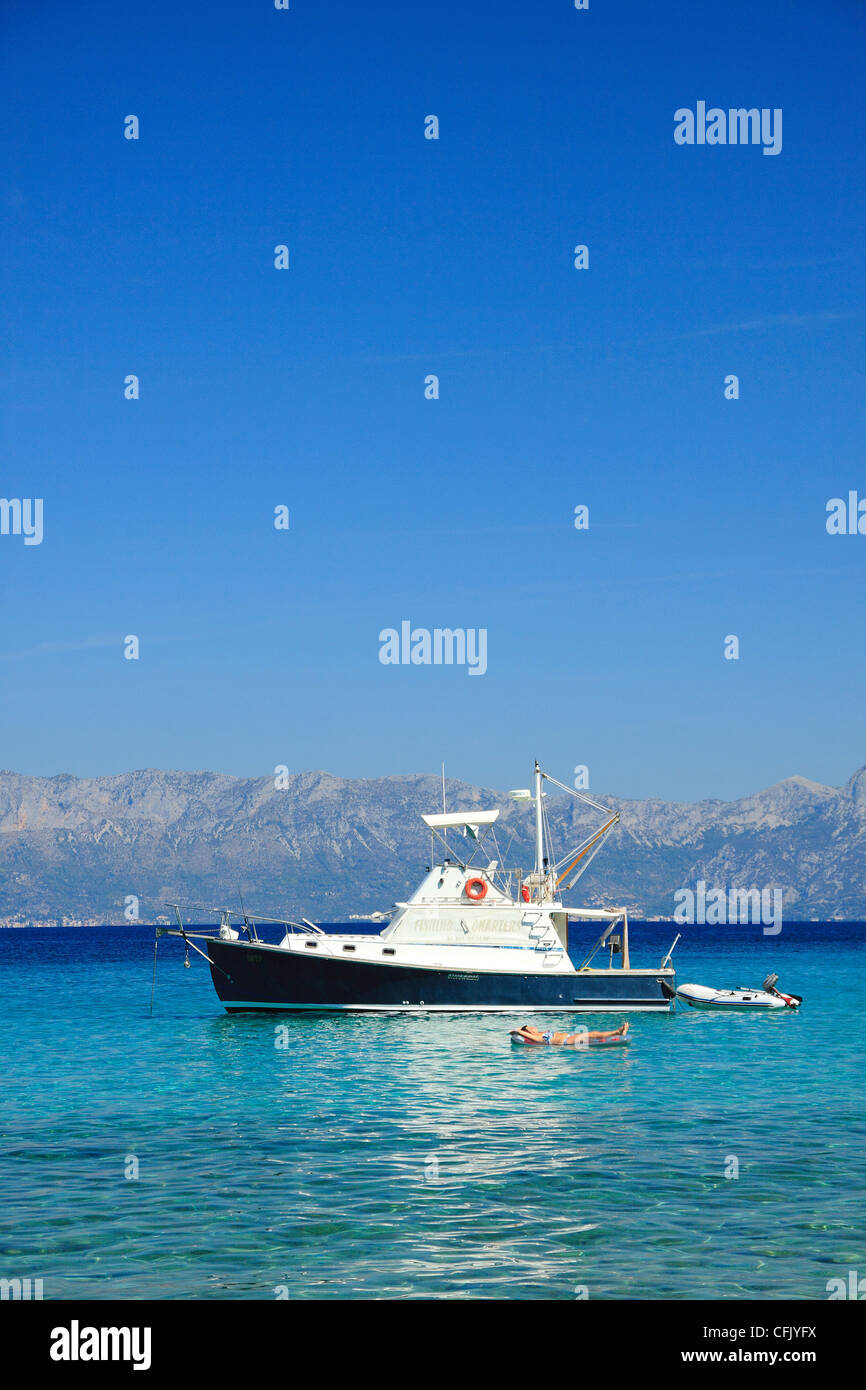 Motorboat moored in Divna bay, Peljesac peninsula, Croatia Stock Photo ...