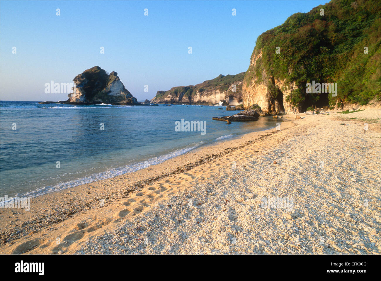 Bird Island Beach, limestone cliffs and Bird Island (Isla Maigo Fahang ...