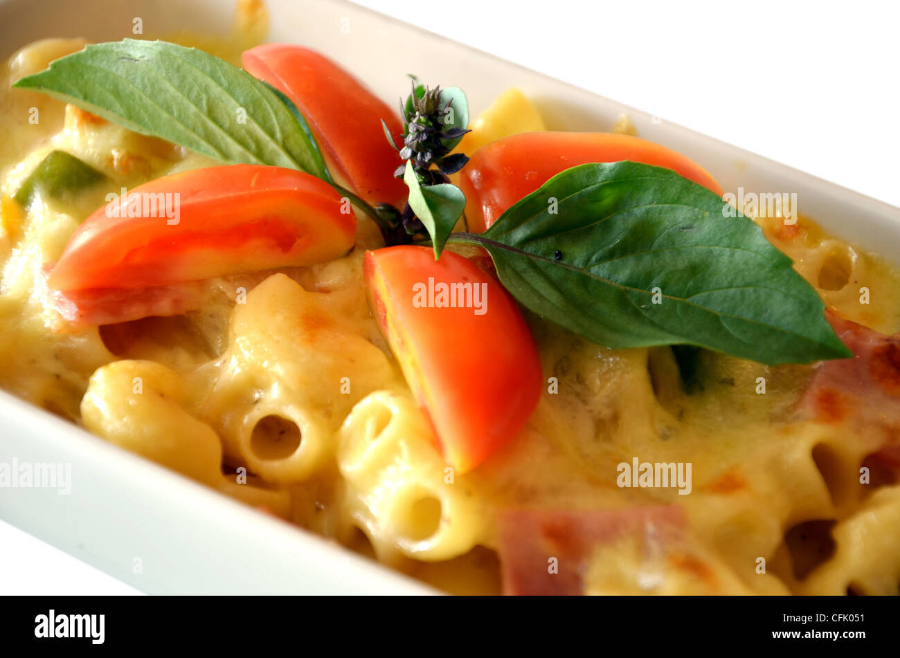 a delicious macaroni with cheese and tomato Stock Photo - Alamy
