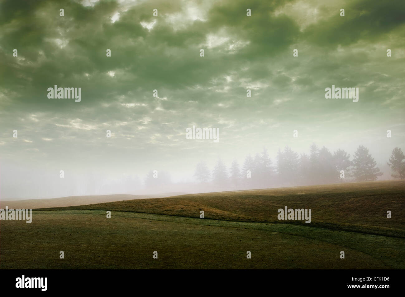 Storm Clouds and Foggy Hills Stock Photo - Alamy