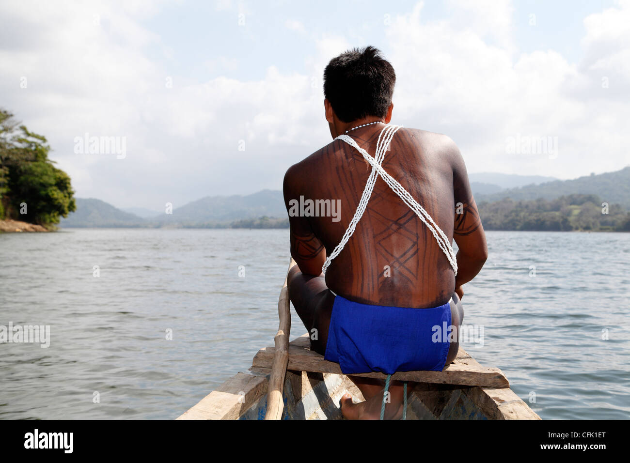 Embera Indian Man Navigates His Canoe Onto The Chagres River, Panama ... Embera Indian Man Navigates His Canoe Onto The Chagres River, Panama ...