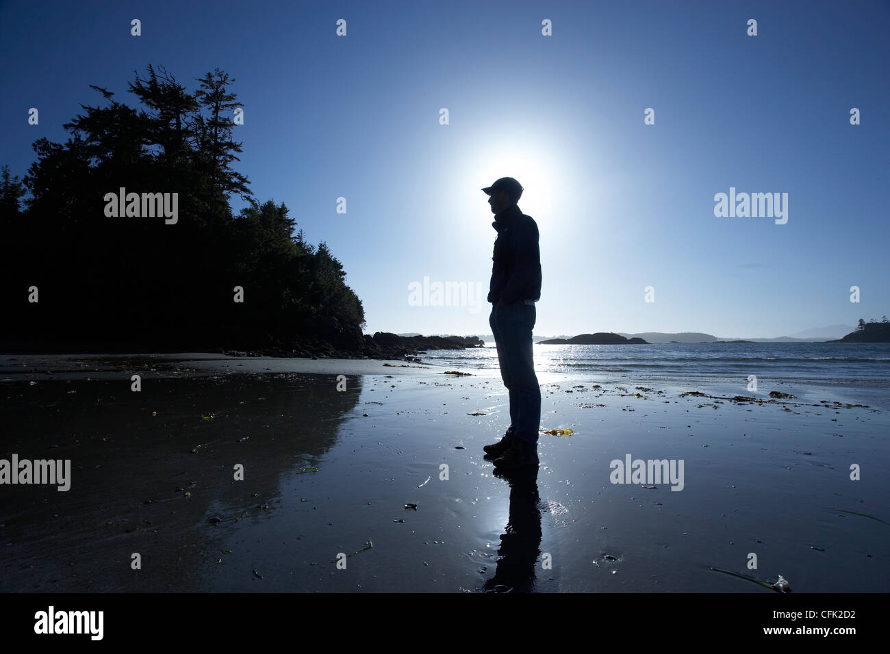 Man Standing on Beach in Tofino, BC, Canada Stock Photo - Alamy