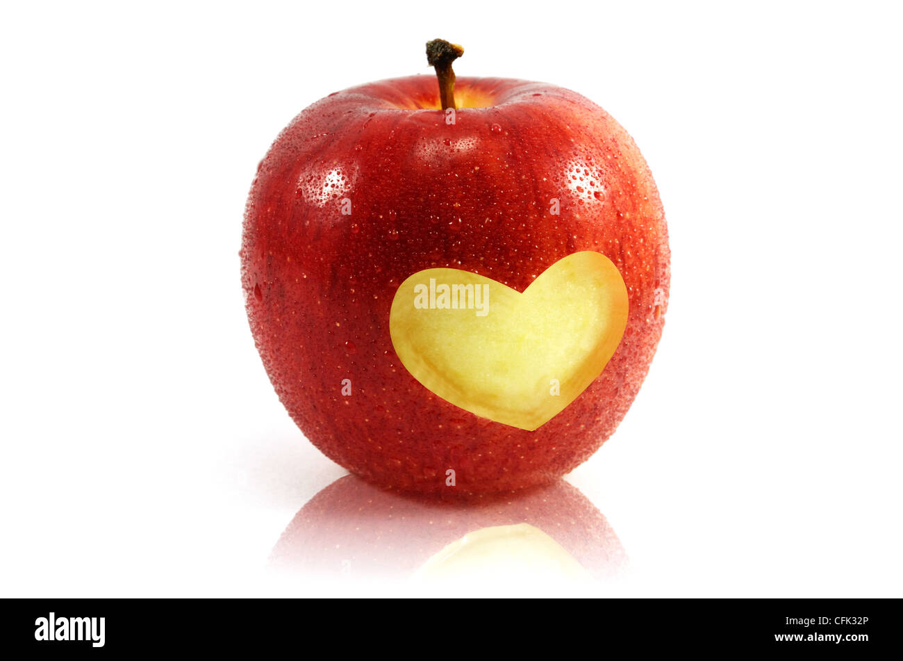 fresh red apple with heart shape Stock Photo - Alamy