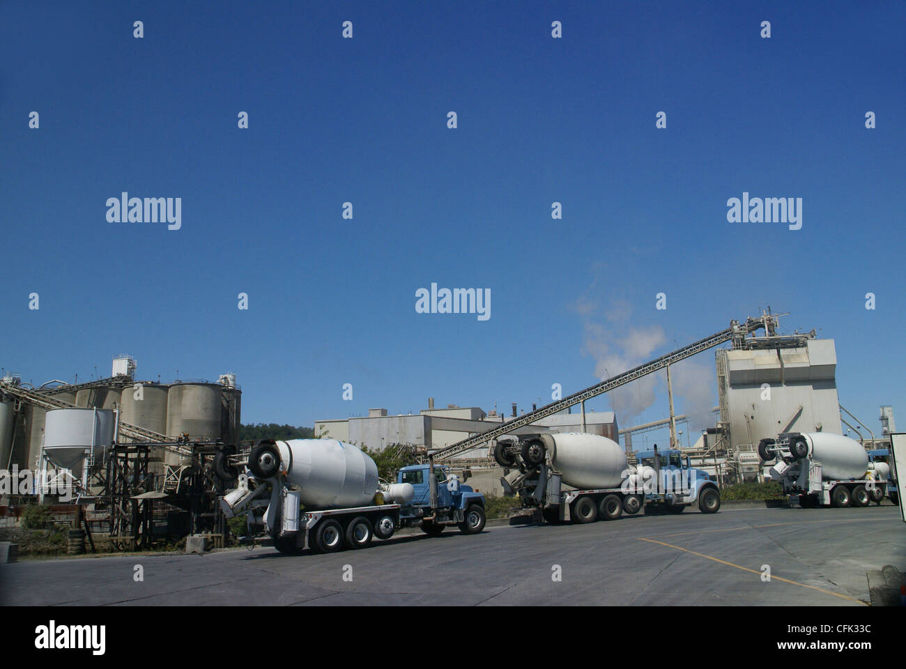 Cement trucks loading at base, Seattle, Pacific Northwest Stock Photo ...