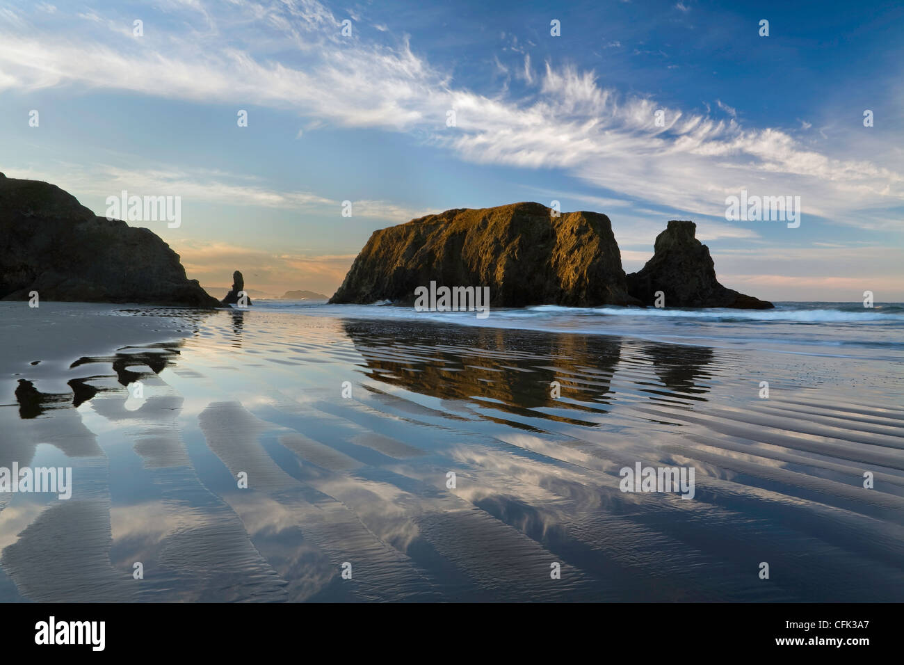 Tidepools and sea stacks at sunrise along Bandon Beach, Oregon. Winter ...