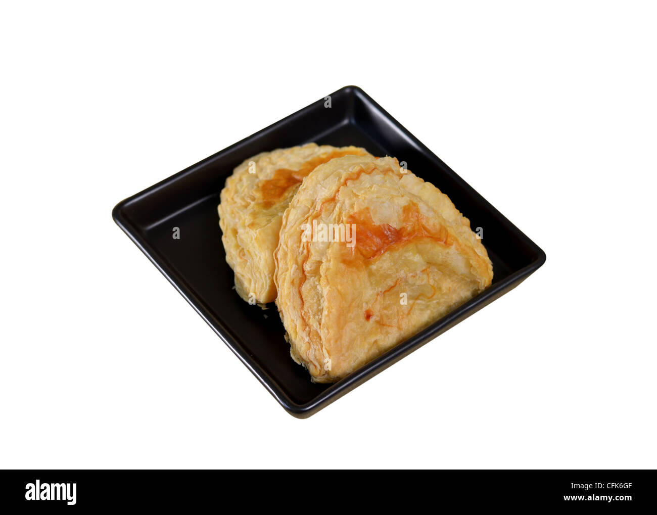 Puff pastry with tuna on the plate , white background Stock Photo - Alamy