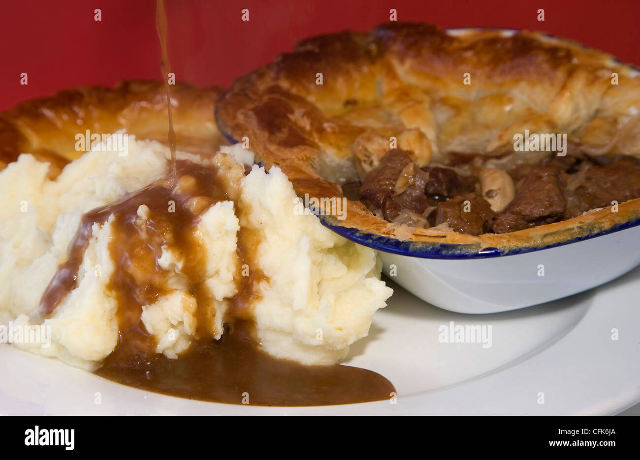 Traditional beef steak pie mash and gravy Stock Photo - Alamy