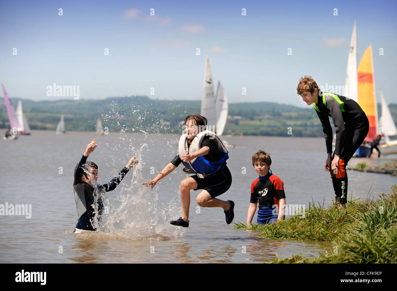 Children playing in river hi-res stock photography and images - Alamy