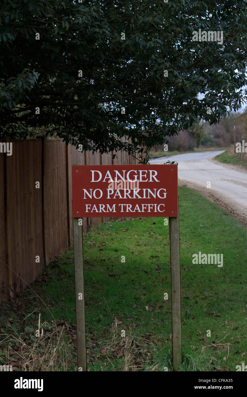 A sign reads Danger No Parking Farm Traffic Stock Photo - Alamy
