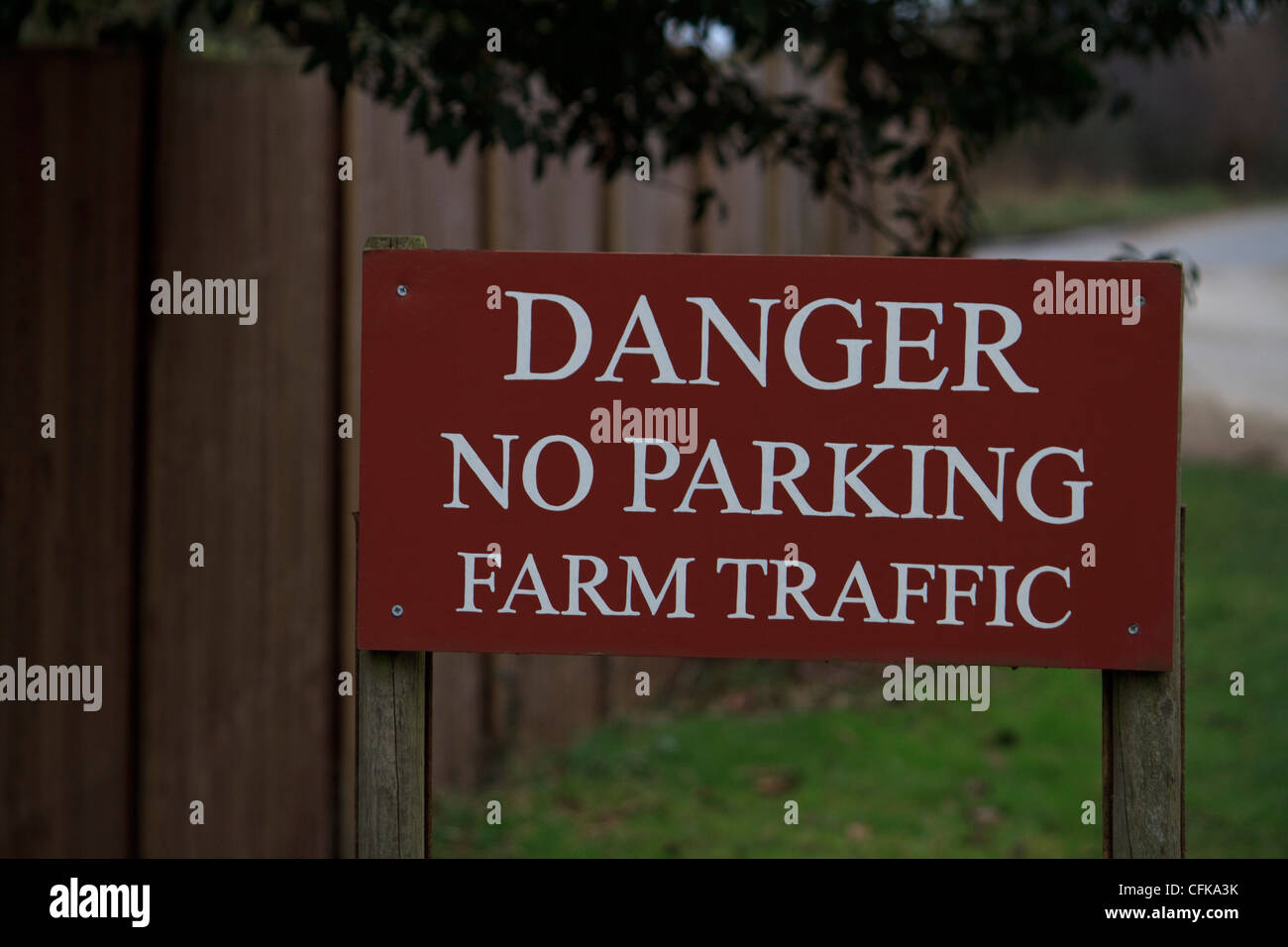 A sign reads Danger No Parking Farm Traffic Stock Photo - Alamy