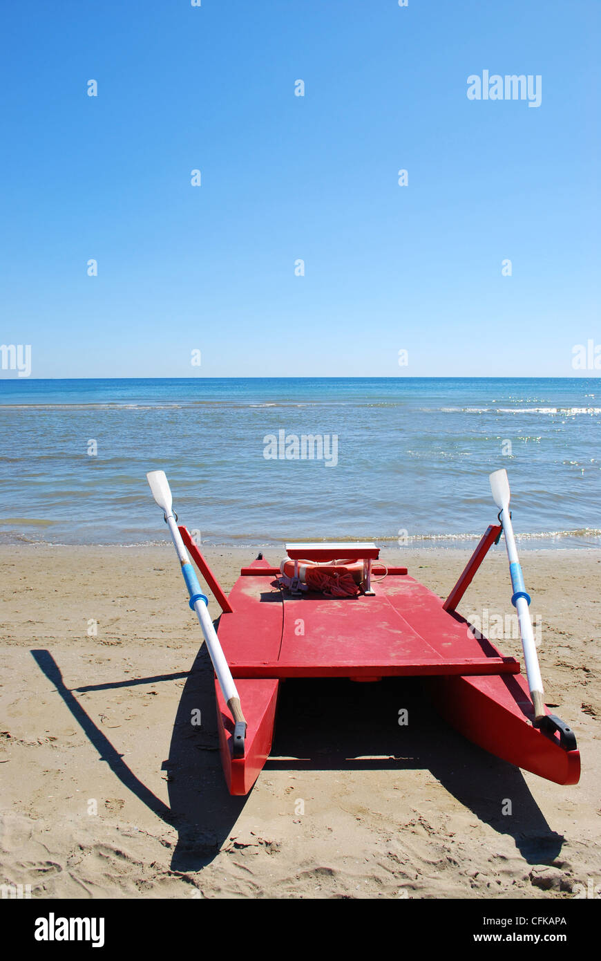 Typical red rescue boat by the sea, Rimini, Italy Stock Photo - Alamy