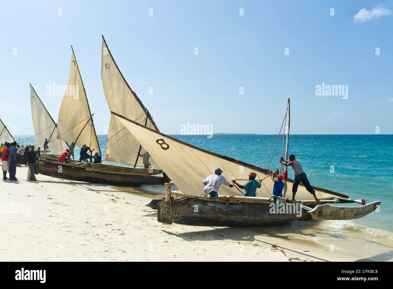 Fishermen prepare their "Ngalawa" the traditional double-outrigger ...