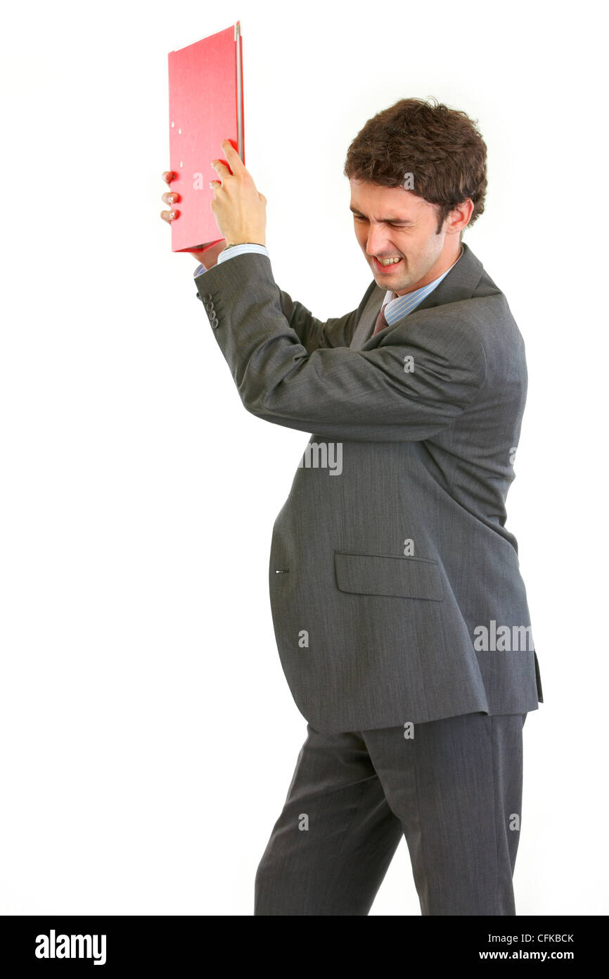 Angry businessman throwing folder isolated on white Stock Photo - Alamy