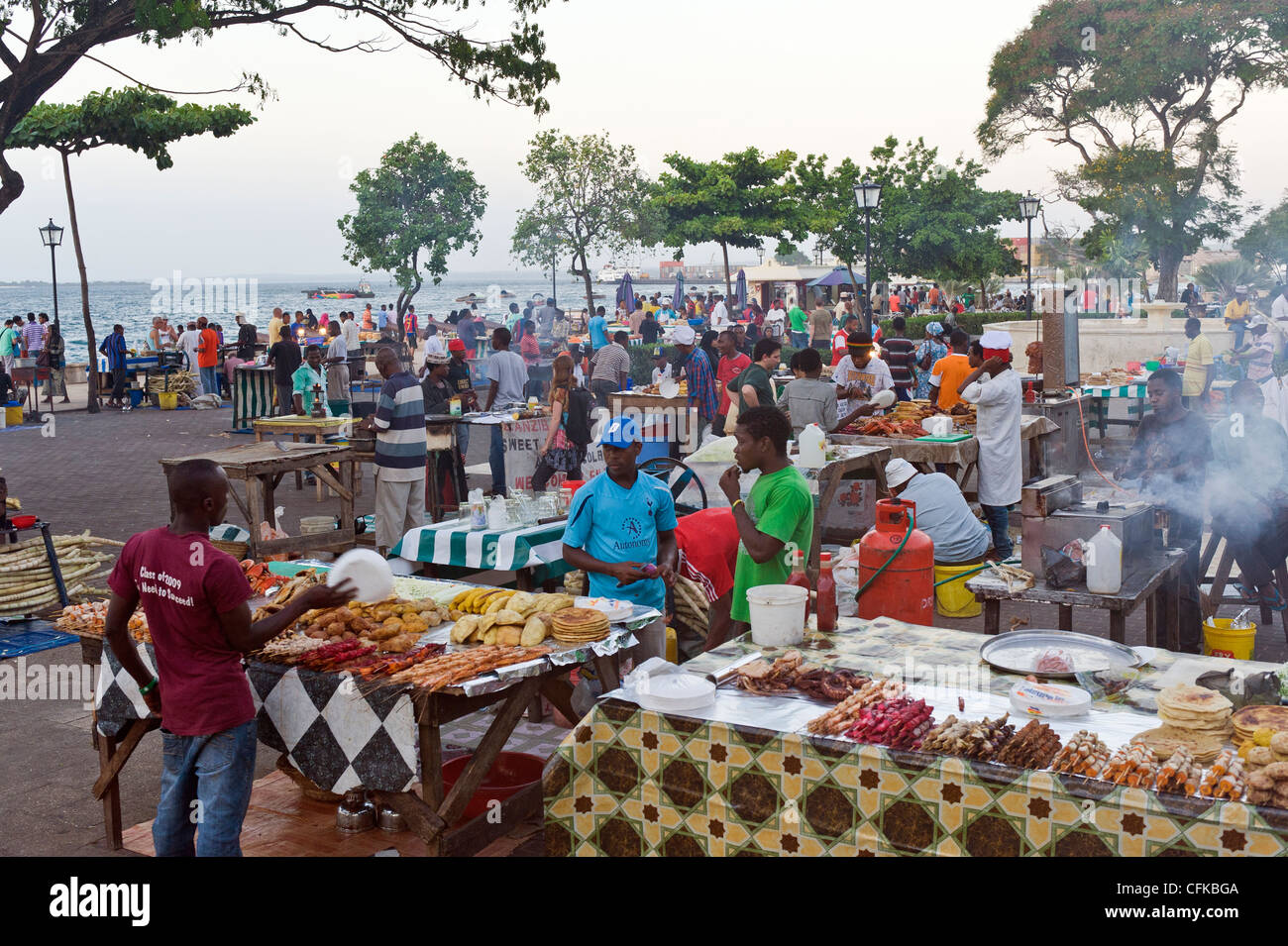 Food vendors selling their unique cuisine at Forodhani Gardens in Stone ...
