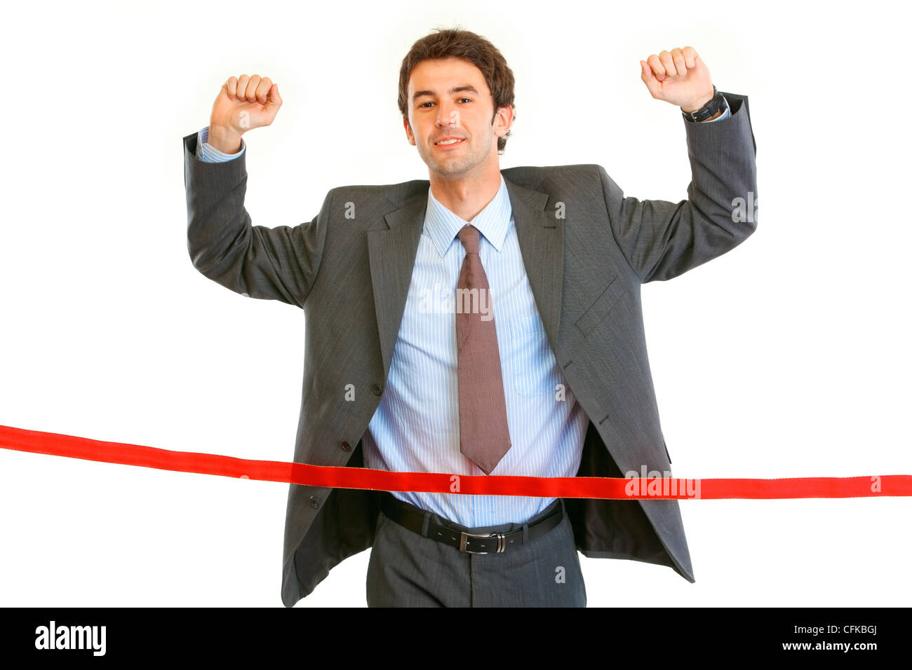 Pleased businessman crossing finish line isolated on white. Concept ...