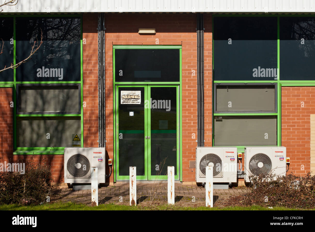 air conditioning units outside fire exit of office building Stock Photo ...