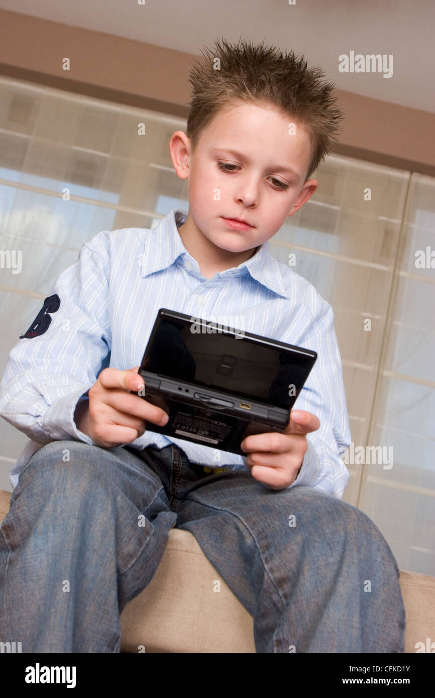 Hand held electronic game hi-res stock photography and images - Alamy