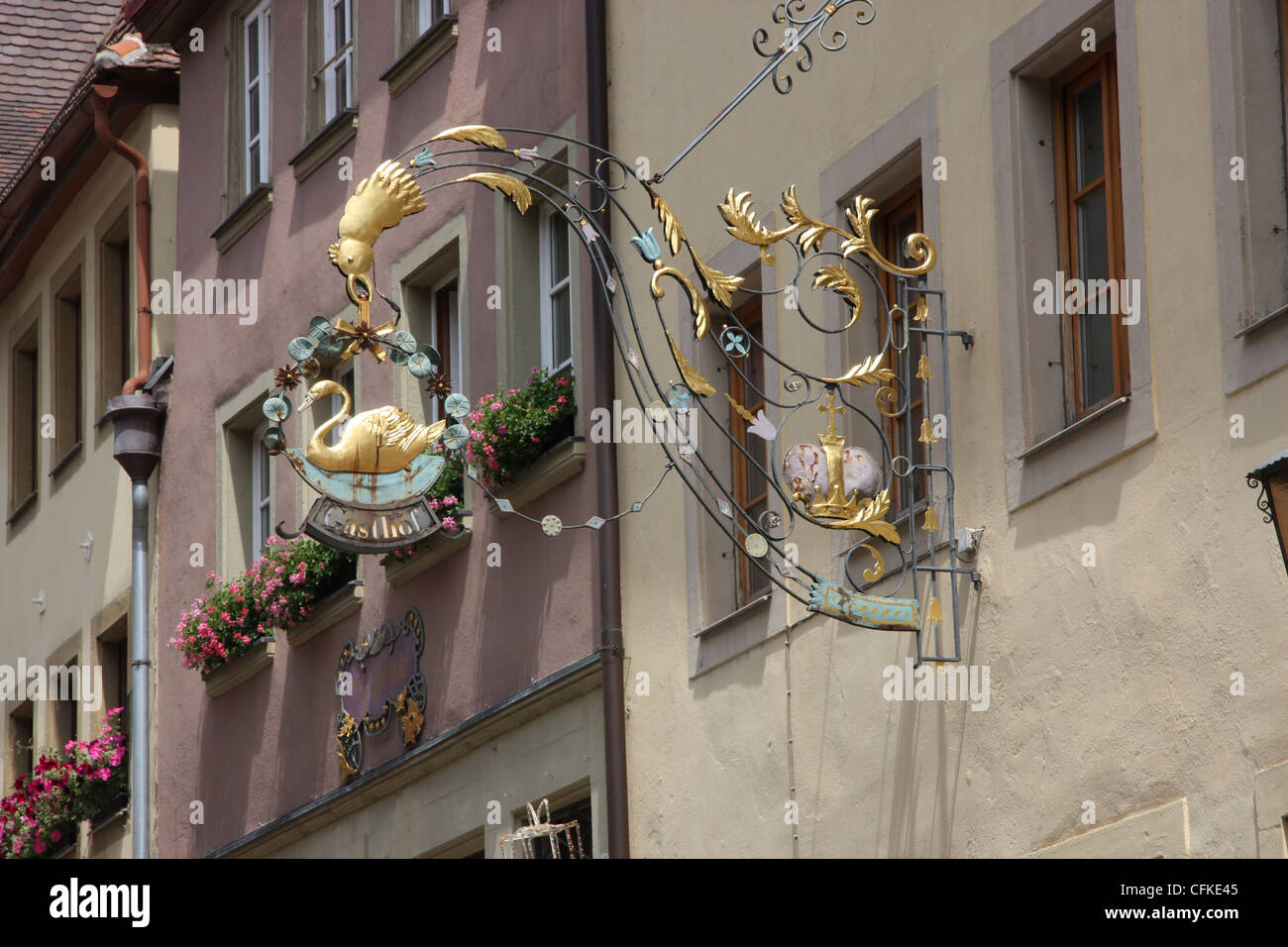 Decorative store signs in Rothenburg, Germany Stock Photo - Alamy