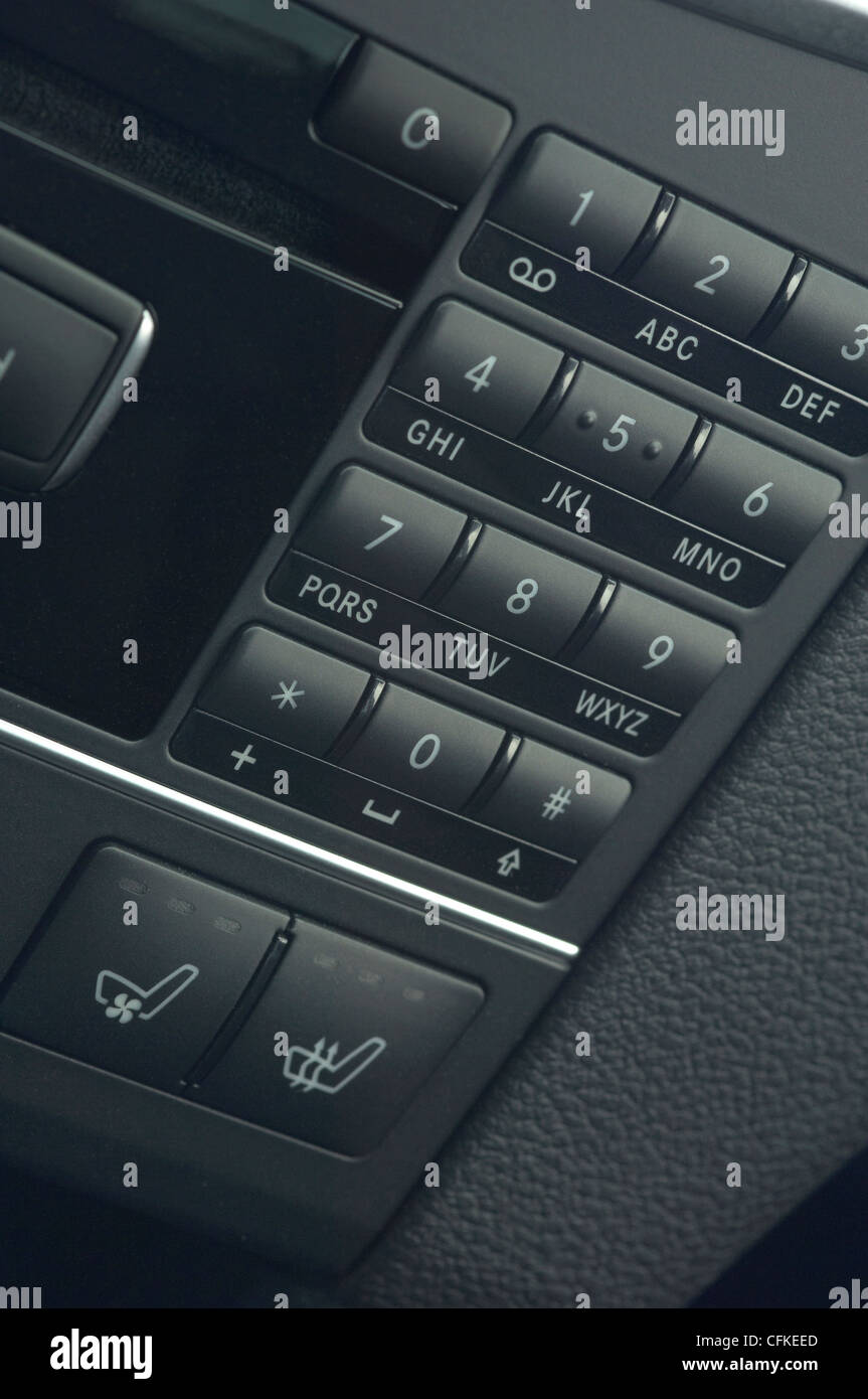 Close up of a middle car control keyboard Stock Photo - Alamy