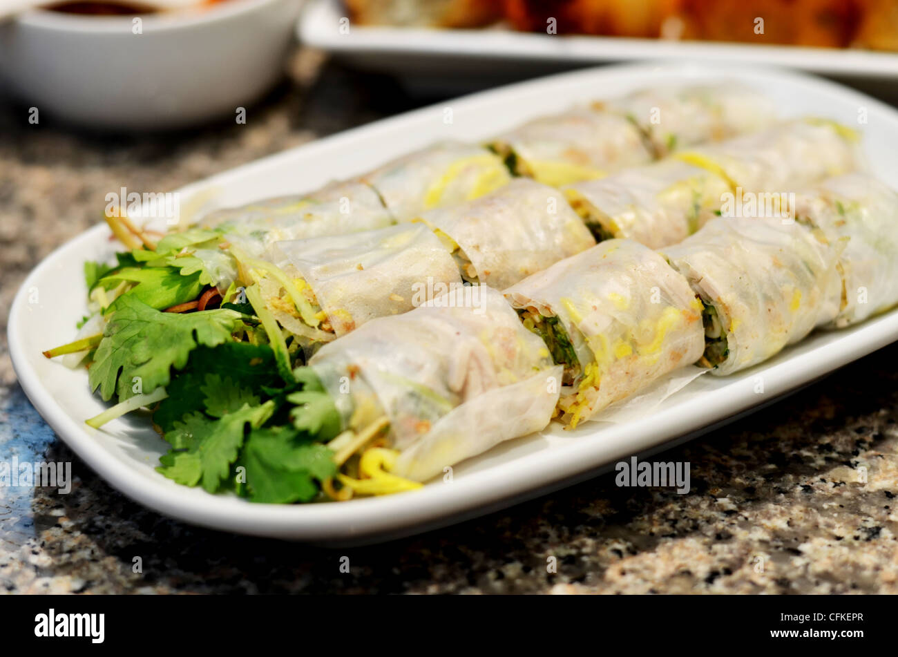 Fresh pork spring rolls with herbs Stock Photo - Alamy